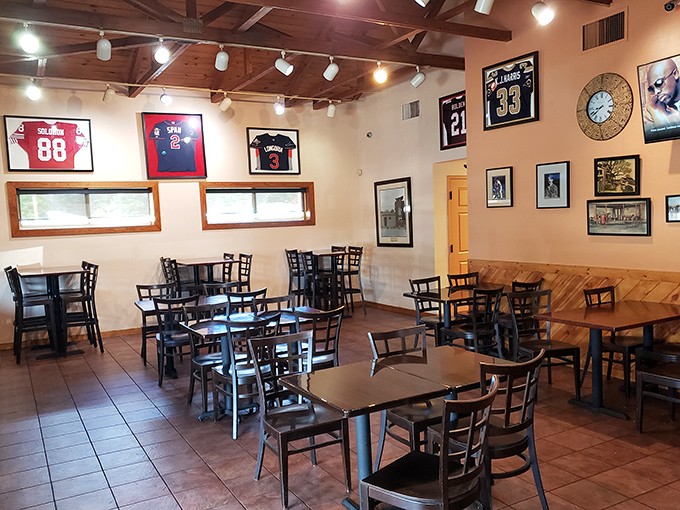 Sports memorabilia and exposed beams create the perfect backdrop for serious barbecue conversations and even more serious eating.