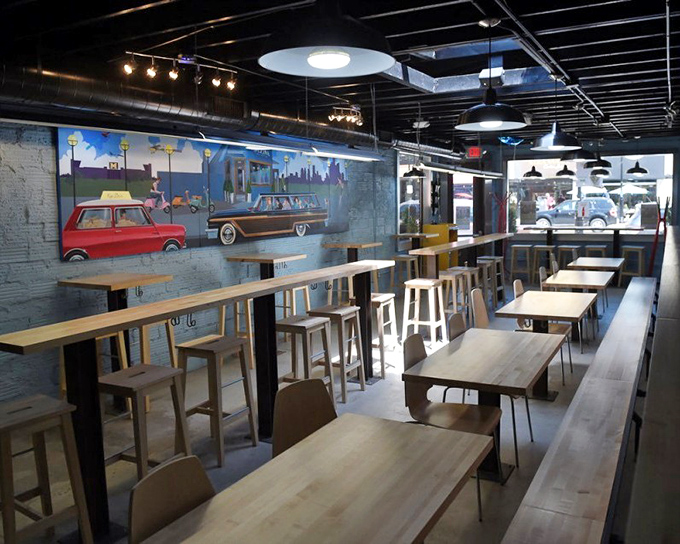 The clean, modern interior features wooden tables and a playful mural of vintage cars&mdash;proof that Greek food and Detroit's automotive heritage can happily coexist.
