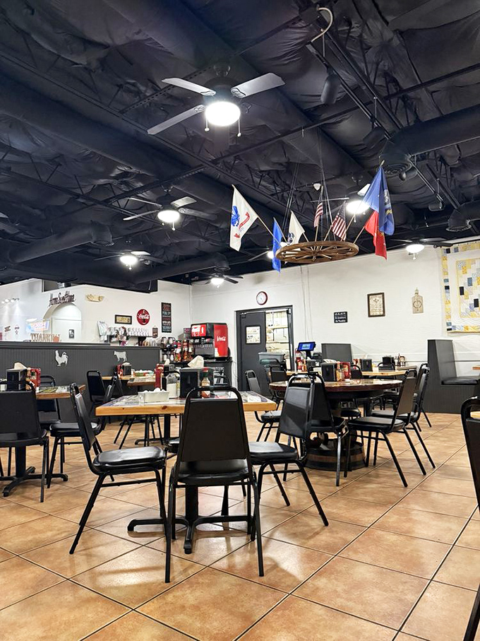 Inside, flags hang from exposed ceiling beams while simple tables await hungry patrons. This isn't Instagram-bait decor—it's the real deal, where food trumps fashion.