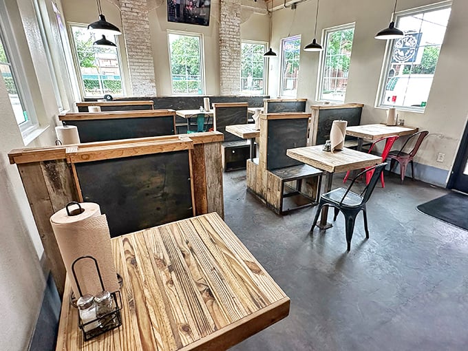 Industrial chic meets comfort food paradise, where exposed brick walls witness countless barbecue miracles daily.