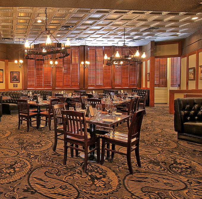 Step inside and time travel to old Arizona elegance &ndash; pressed tin ceilings, rich wood paneling, and leather booths create the perfect backdrop for serious steak business.