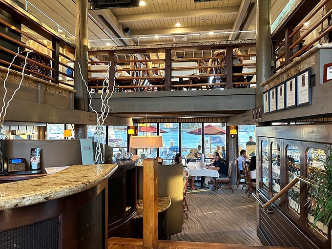 Two-story nautical elegance meets million-dollar harbor views. This isn't just a dining room; it's Newport Beach's ultimate dinner theater.