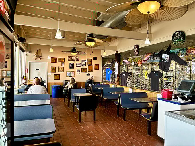 Inside, nautical charm meets casual comfort &ndash; where fishing memorabilia tells stories of ocean adventures while you wait for your coastal feast.