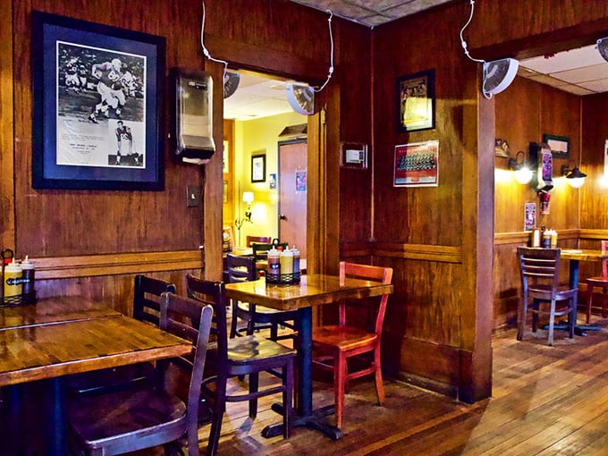 Step inside and you're transported to barbecue country, with warm wood paneling that's absorbed decades of smoky aromas and sports memories.