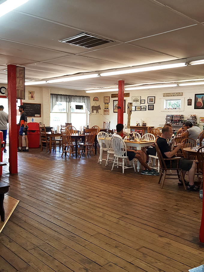 Where barbecue dreams come true. Simple wooden tables, red support columns, and walls adorned with memorabilia create the perfect backdrop for serious eating.
