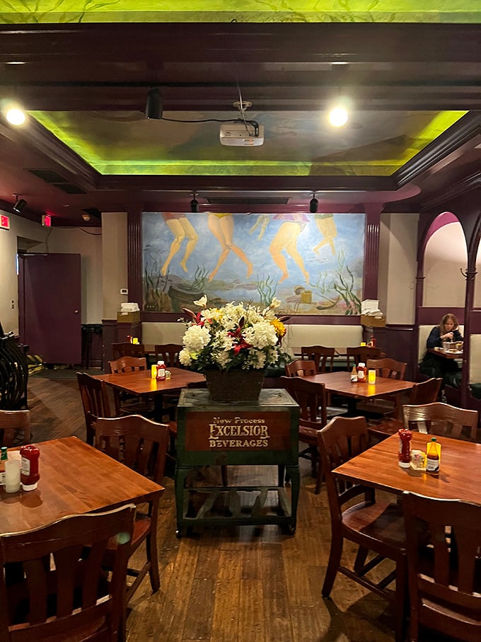 Inside, vintage charm meets Southern hospitality. That underwater mural and Excelsior crate centerpiece? Pure Alexandria magic that makes Wisconsin supper clubs nod in approval.