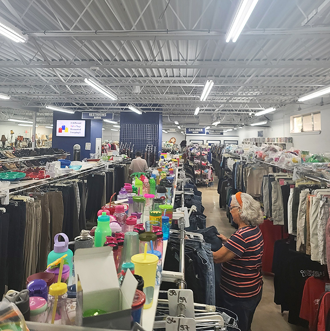 Organized chaos at its finest! Rows of clothing and colorful water bottles create a bargain hunter's version of Disney World&mdash;just without the $15 churros.