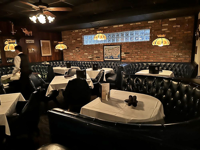 Step inside and you're transported to the golden age of steakhouses. These tufted leather booths have cradled the posteriors of satisfied diners for generations.