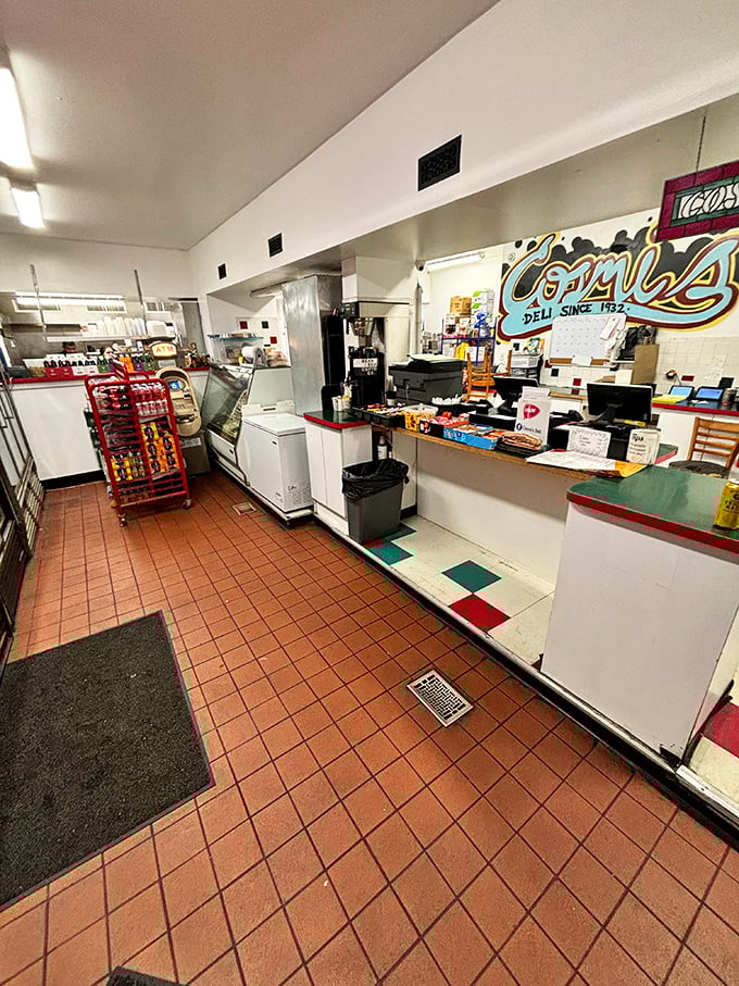 No-frills perfection where sandwich artistry happens. That red-tiled floor has supported generations of hungry Philadelphians waiting for their moment of hoagie bliss.