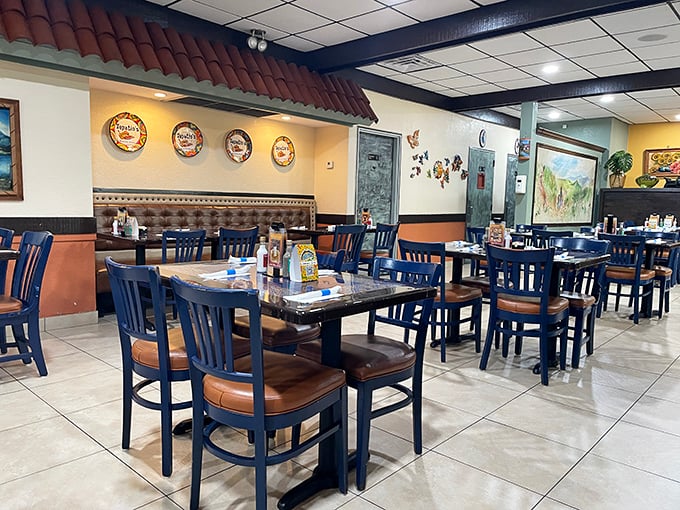 Blue chairs and warm earth tones create the perfect backdrop for memorable meals. This isn't just dining&mdash;it's a mini vacation without the TSA pat-down.