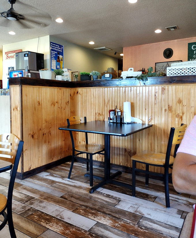 Inside, warm wood paneling and simple furnishings let you know priorities are straight&mdash;all energy goes to the food, not fancy decor.