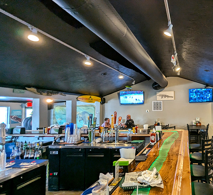 The bar at Nav-A-Gator feels like the living room of that cool uncle who collects fishing memorabilia and always has the best stories.