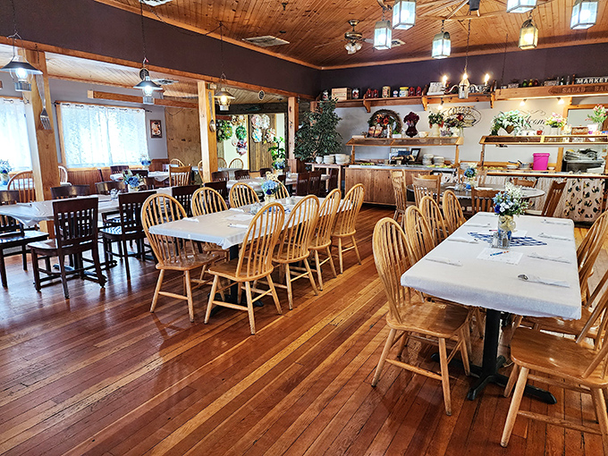 Wooden chairs, warm lighting, and tables set for feasting &ndash; this dining room doesn't need Instagram filters to feel like the coziest spot in Indiana.