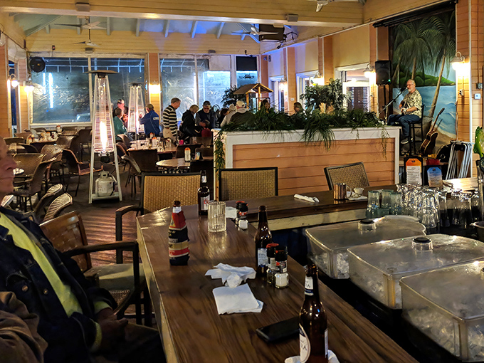 Inside, wooden tables and ceiling fans create that perfect "beach casual" vibe where flip-flops are welcome and seafood cravings are satisfied in equal measure.