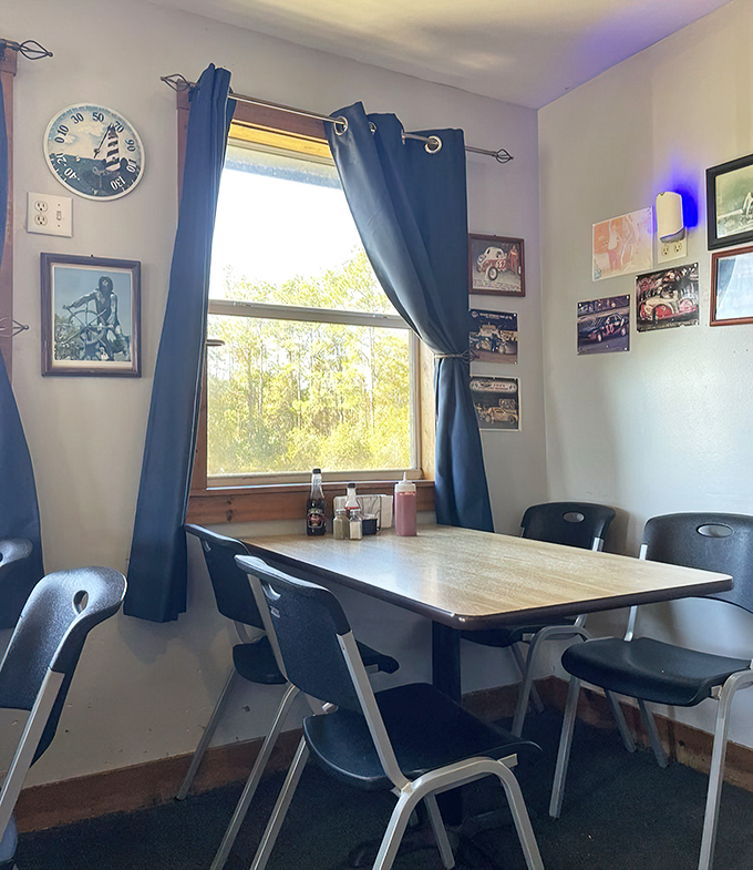 Simple tables, blue curtains, and a view of Florida greenery&mdash;this no-frills dining room lets the seafood do all the talking.