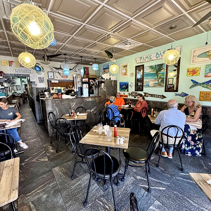 Inside, the mint-green walls adorned with marine art create the perfect backdrop for seafood epiphanies. This isn't fancy&mdash;it's better.
