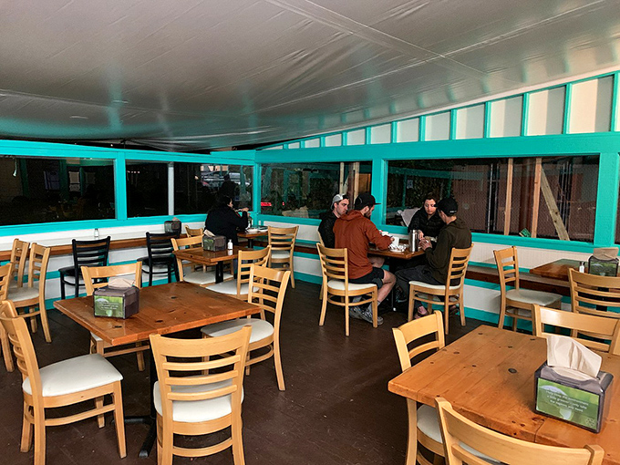 Simple wooden tables and cheerful walls create the perfect stage for extraordinary Mexican comfort food. 