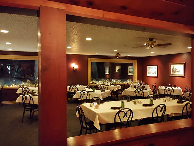 Step inside where warm wood tones and classic supper club elegance create the perfect dining atmosphere.