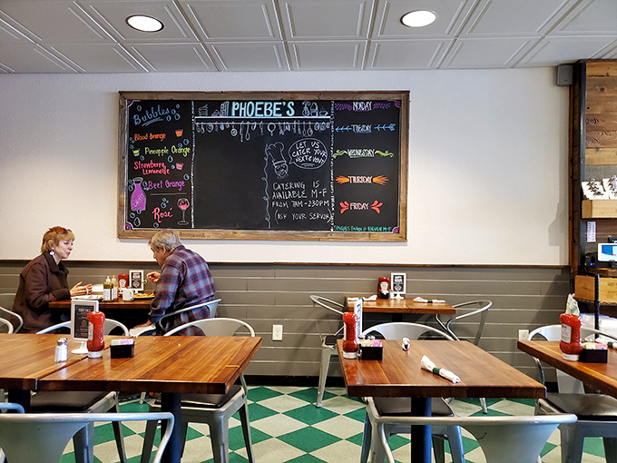 Classic diner vibes meet Austin cool with checkered floors and wooden tables. The chalkboard menu promises delights that'll make your morning infinitely better.
