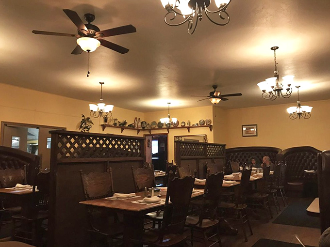 Old-school charm defines this dining room where lattice dividers and warm lighting create intimate spaces. Comfort and conversation flow as freely as the wine.
