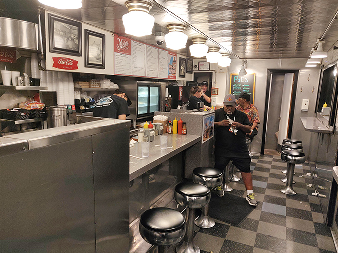 Where strangers become friends over sizzling patties. The classic counter setup isn't retro by design&mdash;it simply never needed changing.