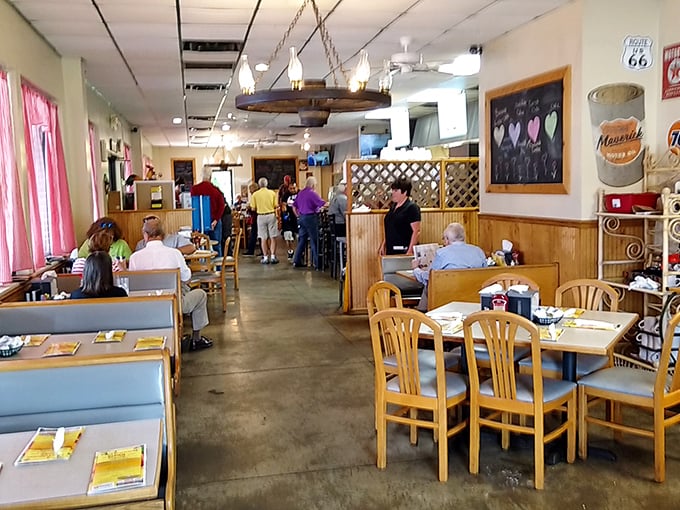 Inside, wood paneling and booth seating create that perfect diner atmosphere where conversations flow as freely as coffee.
