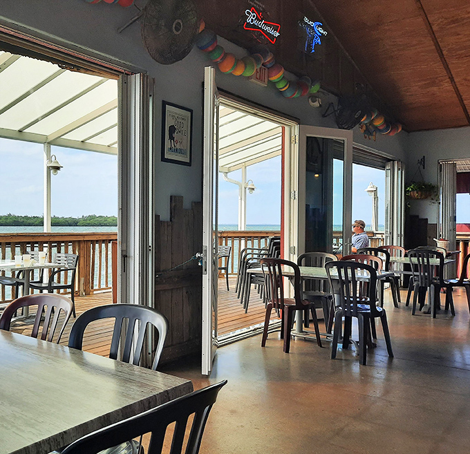Where the outside world dissolves into ocean views. The Old Salty Dog's dining room perfectly frames the Gulf, making every table feel like front-row seating to nature's best show.