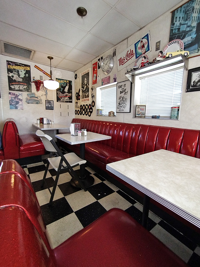 Step into a time warp where Frankenstein watches you eat and red vinyl booths cradle you like a 1950s dream. Nostalgia served all day.