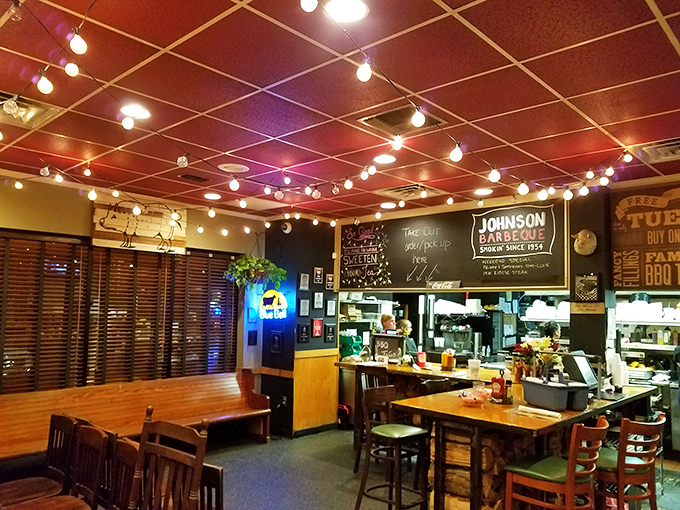 Step inside to a warm glow of string lights and red ceiling panels that create the perfect backdrop for serious eating&mdash;like dining in your coolest friend's back porch.