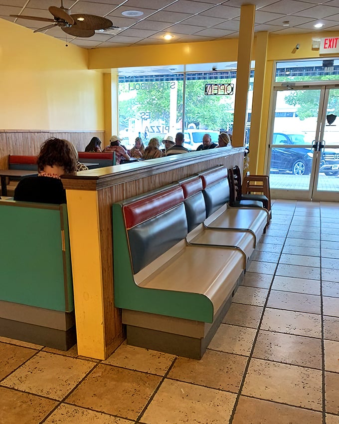 Classic vinyl booths in shades of green and burgundy transport you back to simpler times. Pizza nostalgia comes standard with every visit.