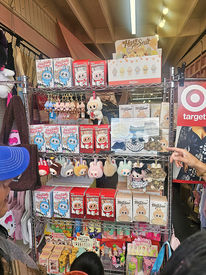 Kawaii culture comes alive at this booth packed with adorable plush keychains and collectibles. Hello Kitty would feel right at home in this colorful corner.