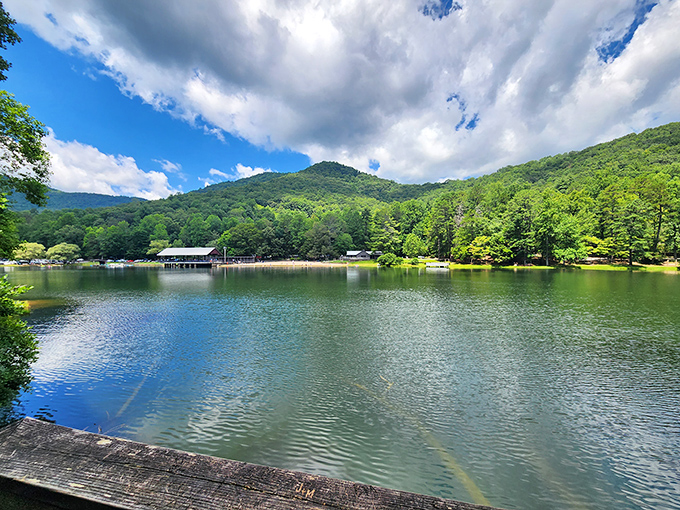 Lake Trahlyta shimmers like nature's mood ring, changing colors with the sky while mountains stand guard over this liquid treasure.