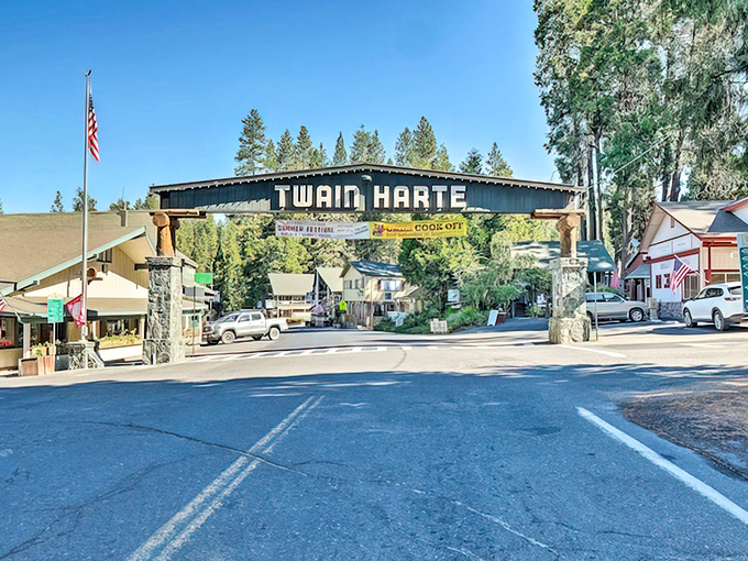 Main Street under clear blue skies &ndash; where rush hour means three cars waiting for a family of deer to cross the road.