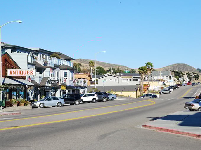Main Street Cayucos &ndash; where "rush hour" means three cars waiting at the town's only stoplight and nobody minds one bit.