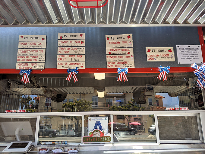 This order window is where strawberry dreams come true, complete with patriotic bunting that screams "America loves dessert!"