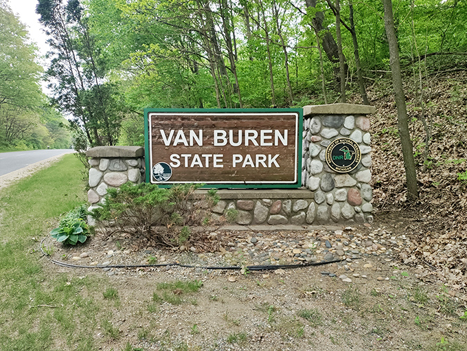 Welcome to paradise, Michigan-style. This unassuming entrance sign marks the threshold between ordinary life and your next favorite memory.