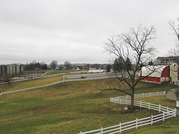 White picket fences carve the landscape into a patchwork quilt of farmland. In Amish Country, even property lines have a certain poetic simplicity.
