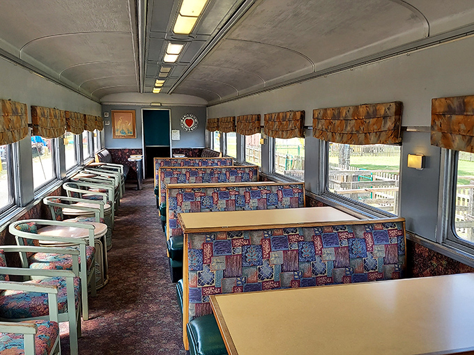 Step inside and travel back to an era when dining cars meant real tables, patterned upholstery, and conversations with strangers who became friends by journey's end.