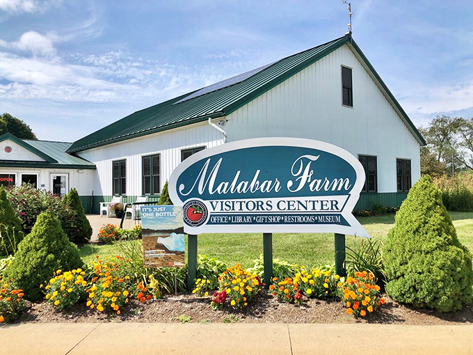 Welcome to farm paradise! The visitor center's vibrant flower beds greet you like an enthusiastic host who can't wait to show you around.