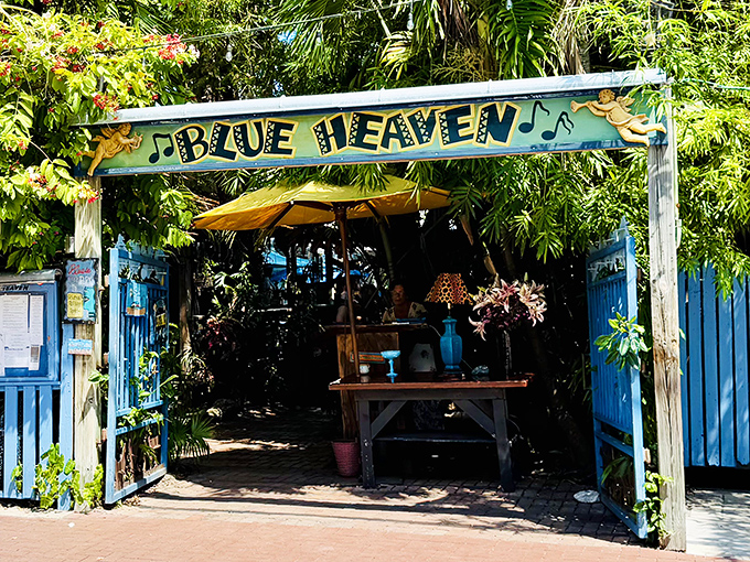 Blue Heaven's entrance is like finding the gateway to a secret tropical garden party where dessert is always invited.