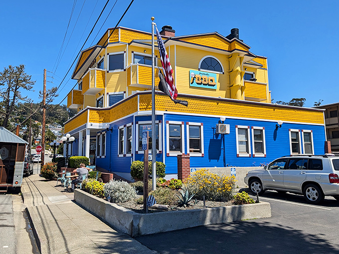 This sunny yellow Victorian screams "beach town BBQ" louder than a seagull spotting french fries. 