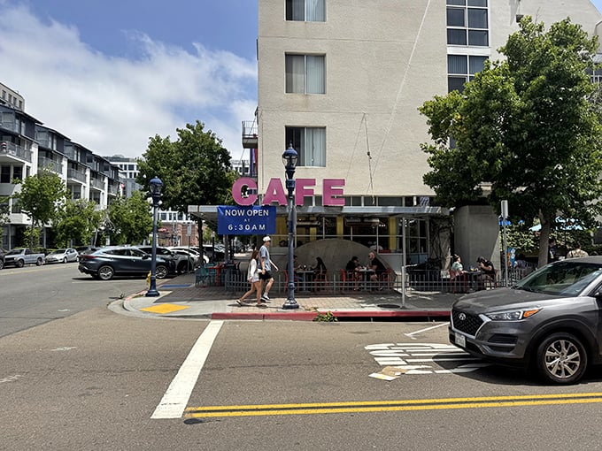 The pink "CAFE" sign beckons like a neon promise of breakfast nirvana &ndash; San Diego's morning happy place.