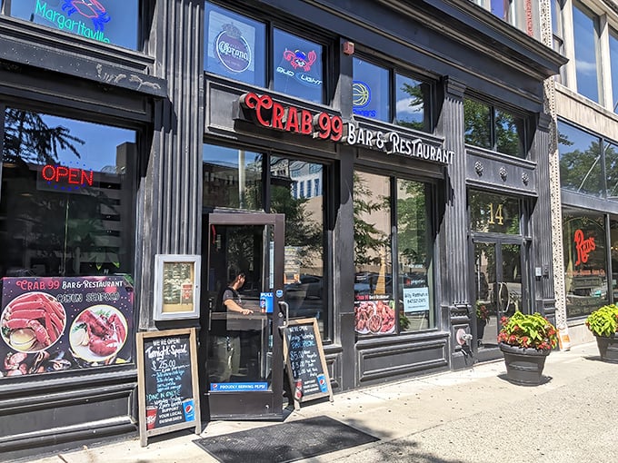 Crab 99's sleek black storefront stands out in downtown Indy like a pearl in an oyster.