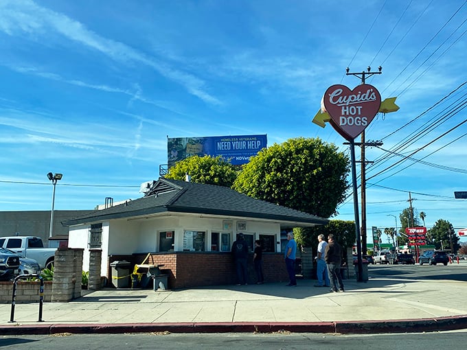 Cupid's heart-shaped sign isn't just cute – it's a promise of hot dog love at first bite that keeps fans coming back for decades.