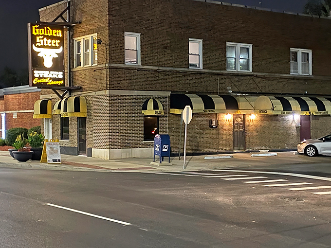 That yellow and black awning signals you've found the mothership of meat. Old-school steakhouse perfection awaits!