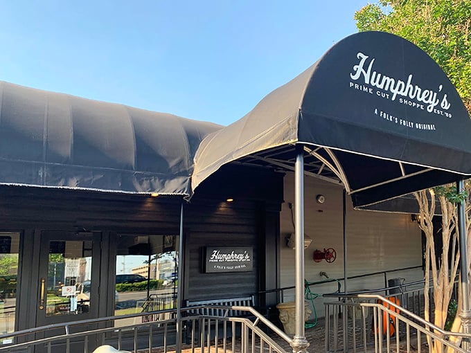 Humphrey's black awning signals serious steak business ahead – like a secret clubhouse where the password is "medium rare."