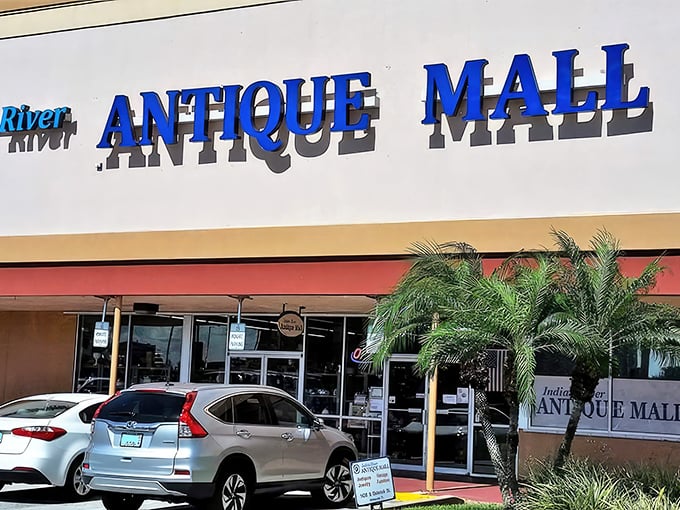 Indian River Antique Mall's bright blue signage pops against the Florida sky &ndash; a beacon for treasure seekers.