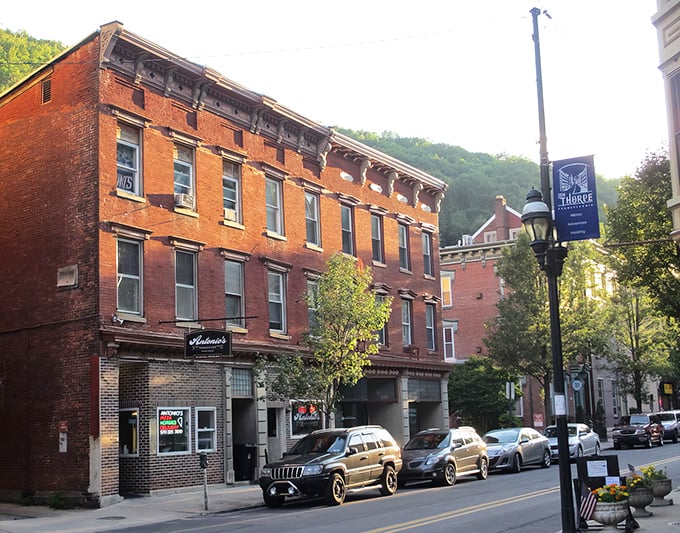 Jim Thorpe's brick buildings nestled against the mountains &ndash; where Victorian charm meets nature's grandeur. No filter needed for this postcard view!