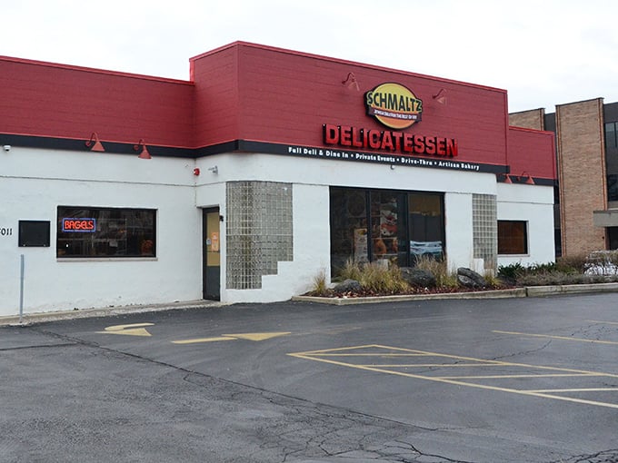 Schmaltz Delicatessen's red and white facade whispers old-school deli secrets from Lisle. 