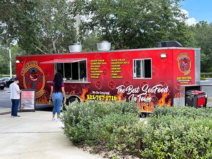 Seafood Bandits' fiery red truck is like a beacon for seafood lovers &ndash; bold, unapologetic, and promising flavors that'll make you an accomplice to deliciousness.